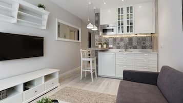 Apartamento | Kitchenette privada | Minifrigorífico, uma máquina de café expresso, uma cafeteira/bule
