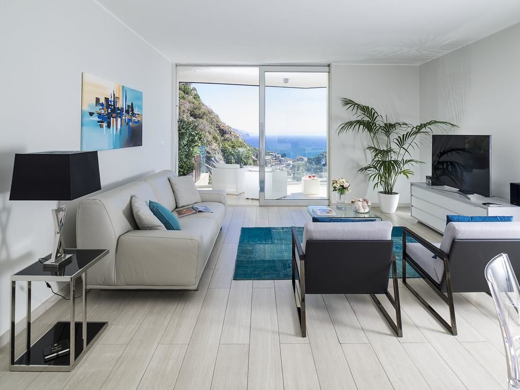 Apartamento premium, terraço, vista para o mar | Área de estar