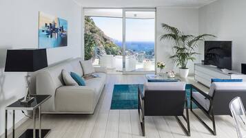 Apartamento premium, terraço, vista para o mar | Área de estar