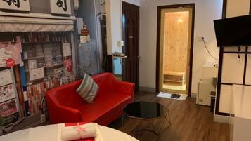 Quarto casal superluxo, sauna seca | Escrivaninha, ferros/tábuas de passar roupa, Wi-Fi de cortesia