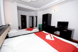 Minibar, secretária, quartos insonorizados, ferro/tábua de engomar