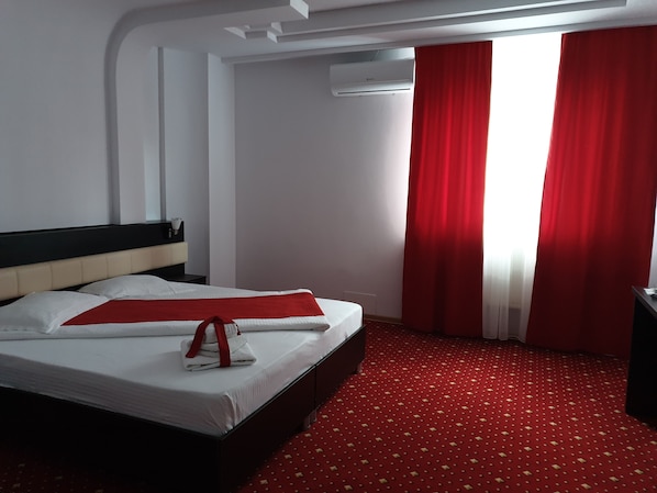 Minibar, secretária, quartos insonorizados, ferro/tábua de engomar