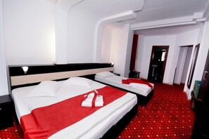 Minibar, secretária, quartos insonorizados, ferro/tábua de engomar
