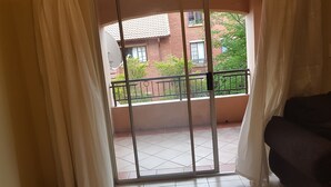 Apartamento família | Sacada
