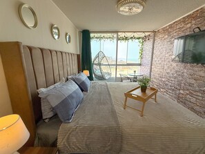 Apartamento Exclusivo, 3 quartos, vista para o oceano | 3 quartos, secretária, secretária adequada para computadores portáteis 