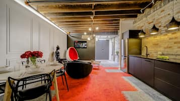 Suite Design, 1 cama king-size, não fumadores | Sala de estar | Smart TV