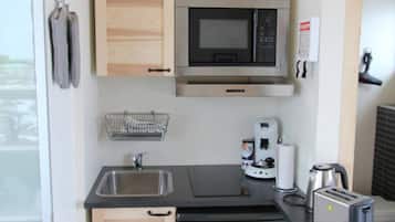 Cabana, 1 quarto | Cozinha americana privada | Geladeira, micro-ondas, cooktop, cafeteira/chaleira