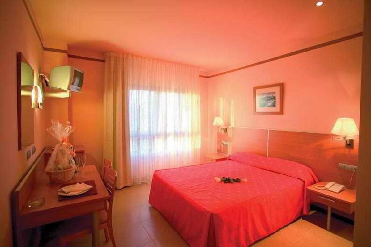 Roupa hipoalergénica, minibar, secretária, cortinas/cortinados opacos 