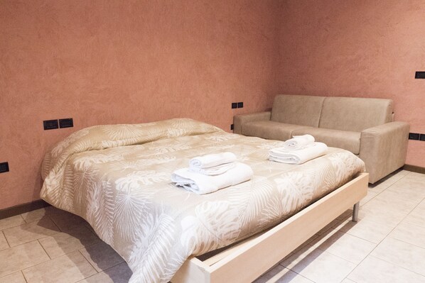 Apartamento Design, 2 quartos | 1 quarto, secretária, Wi-fi grátis, roupa de cama fornecida