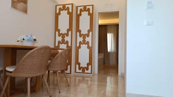 Apartamento Panorâmico | Cozinha privada | Um frigorífico/congelador grande, uma placa de cozinha