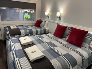 Quarto duplo | 1 quarto, camas com colchões pillow-top, individualmente decorados