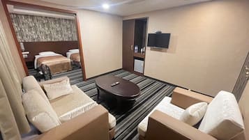 Quarto duplo empresarial | Escrivaninha, cortinas blackout, Wi-Fi de cortesia