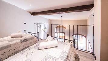 Apartamento, 2 quartos | 1 quarto, Wi-Fi de cortesia, roupa de cama