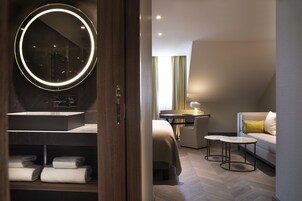 Suíte júnior | Frigobar, cofres nos quartos, quartos à prova de som, Wi-Fi de cortesia