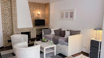 Quarto quádruplo família, 1 quarto | Escrivaninha, ferros/tábuas de passar roupa, Wi-Fi de cortesia