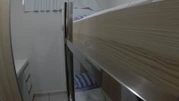 Apartamento família | 2 quartos, cortinas blackout, Wi-Fi de cortesia, roupa de cama