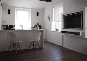 Apartamento, 2 quartos | Área de estar