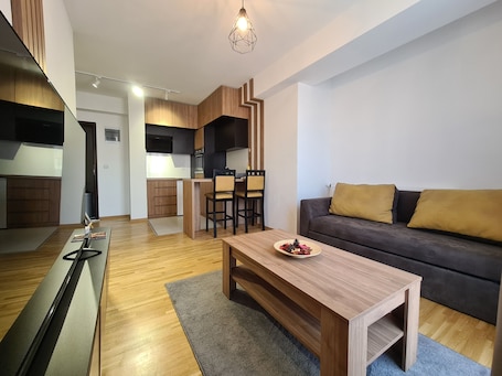 Superior Apartment Street Anastas Mitrev number 10 | Sala de estar | Televisor LCD de 40 polegadas com canais por cabo, televisor . Smart Apartments Skopje