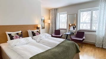 Suite Deluxe | 1 quarto, ferro/tábua de engomar, Wi-fi grátis, roupa de cama fornecida