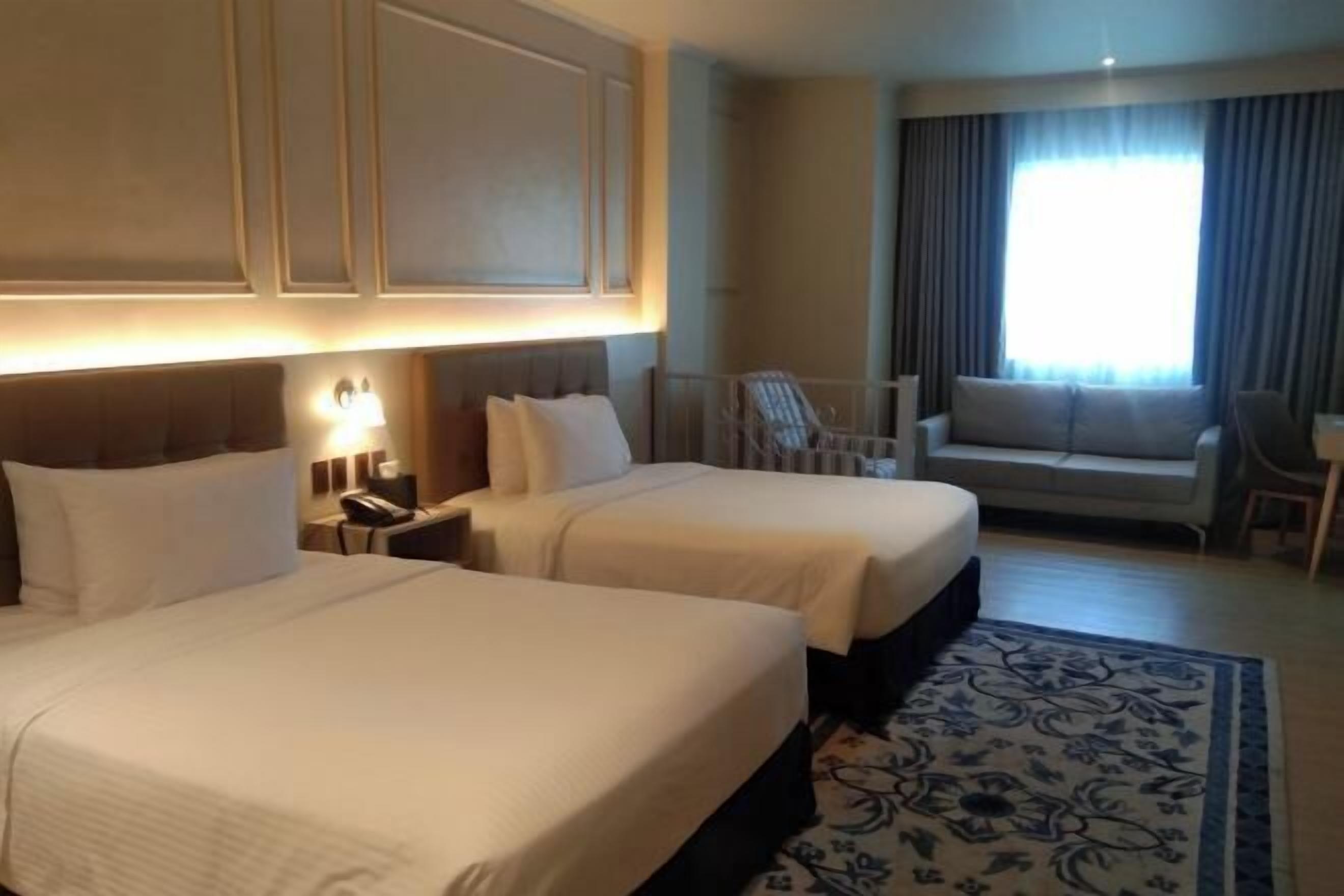 Roupa de alta qualidade, camas de colchão pillowtop, minibar 