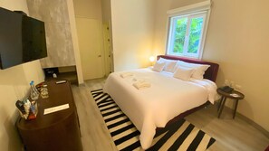 Suite Superior | Roupa de alta qualidade, minibar, cofre no quarto 