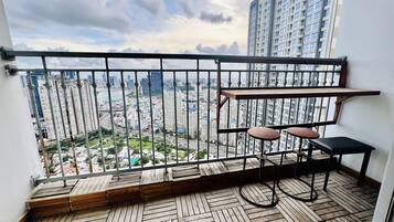 Apartamento executivo, 3 quartos | Terraço/pátio