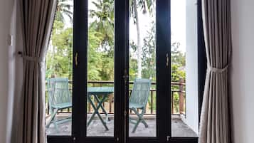 Suite Deluxe, 1 cama king-size, vista para o jardim | Vista para o jardim
