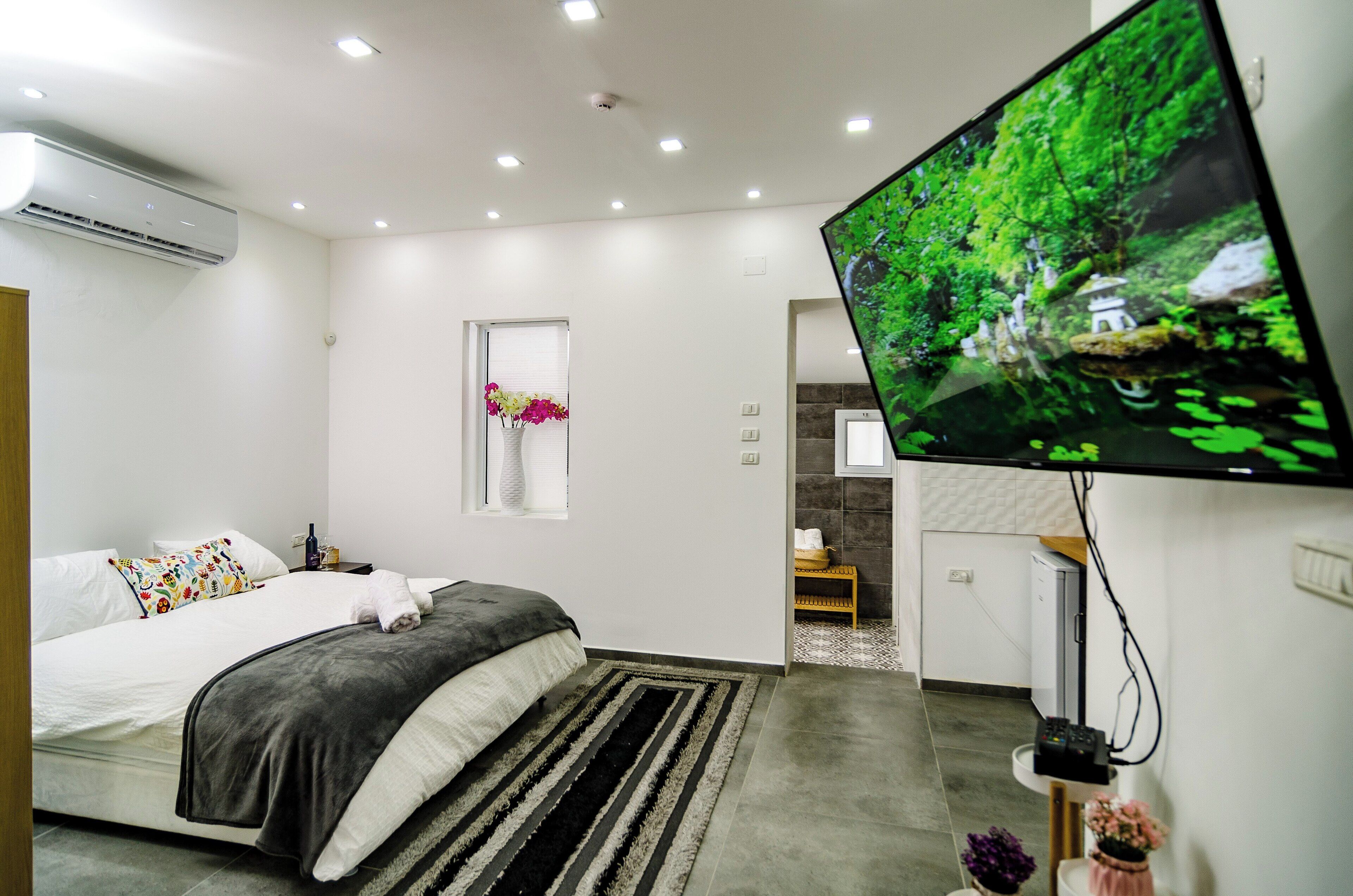 Suite Familiar, não fumadores | Sala de estar | TV de ecrã plano 