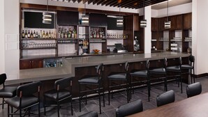 Uma área de bar moderna com um balcão extenso, vários bancos altos e uma variedade de garrafas e copos.