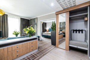 Apartamento superior | Área de estar | TV de tela plana