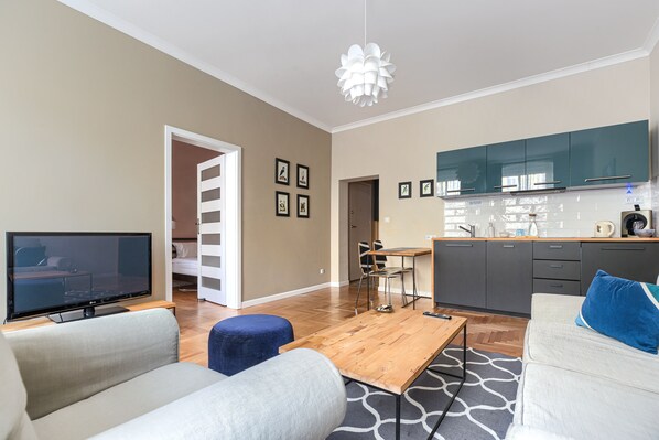 Apartamento superior, 1 cama Queen e sofá-cama, para não fumantes | Sala de jantar