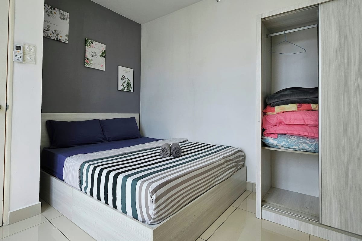 Apartamento Deluxe | 3 quartos, cortinas/cortinados opacos, ferro/tábua de engomar