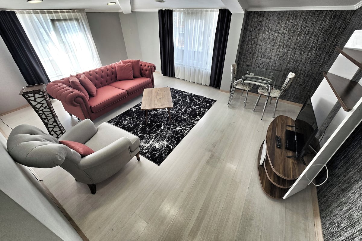 Condo standard | Área de estar | TV LCD