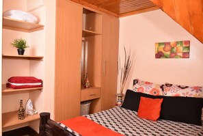 Apartamento, 1 cama de casal, para não fumantes | 1 quarto, roupas de cama premium, Wi-Fi de cortesia, roupa de cama