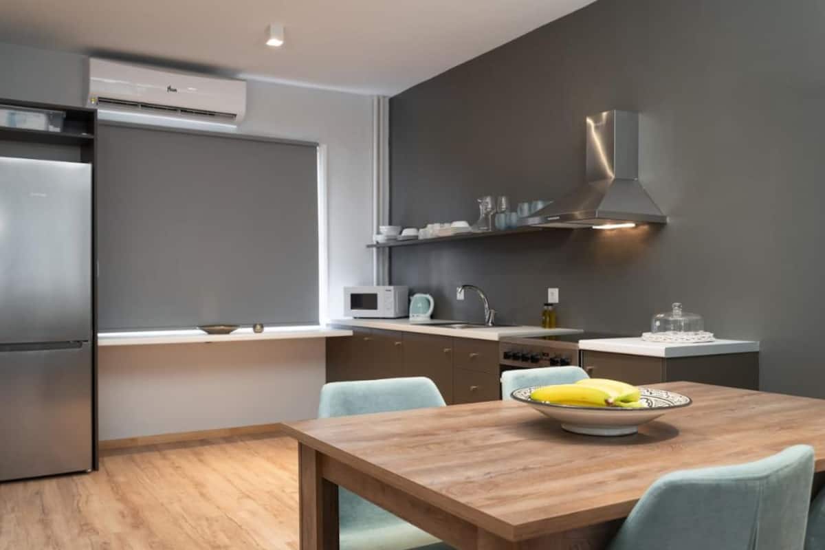 Apartamento superior | Cozinha privada | Micro-ondas, cafeteira/chaleira, chaleira elétrica