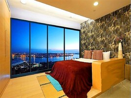 Quarto Duplo Deluxe, vista para o oceano | Secretária, cortinas/cortinados opacos, Wi-fi grátis 