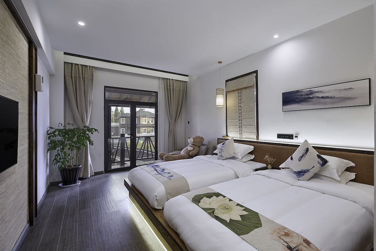 Quarto duplo com design assinado | Wi-Fi de cortesia