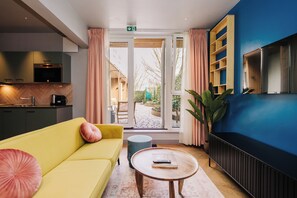 Apartamento Familiar | Sala de estar | TV de ecrã plano 