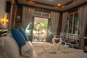 Bungalow Deluxe, 1 cama queen-size, não fumadores, vista para o mar | Roupa de alta qualidade, cortinas/cortinados opacos 