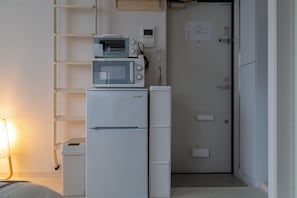Apartamento com design assinado, 1 cama de solteiro grande, para não fumantes | Minirrefrigerador