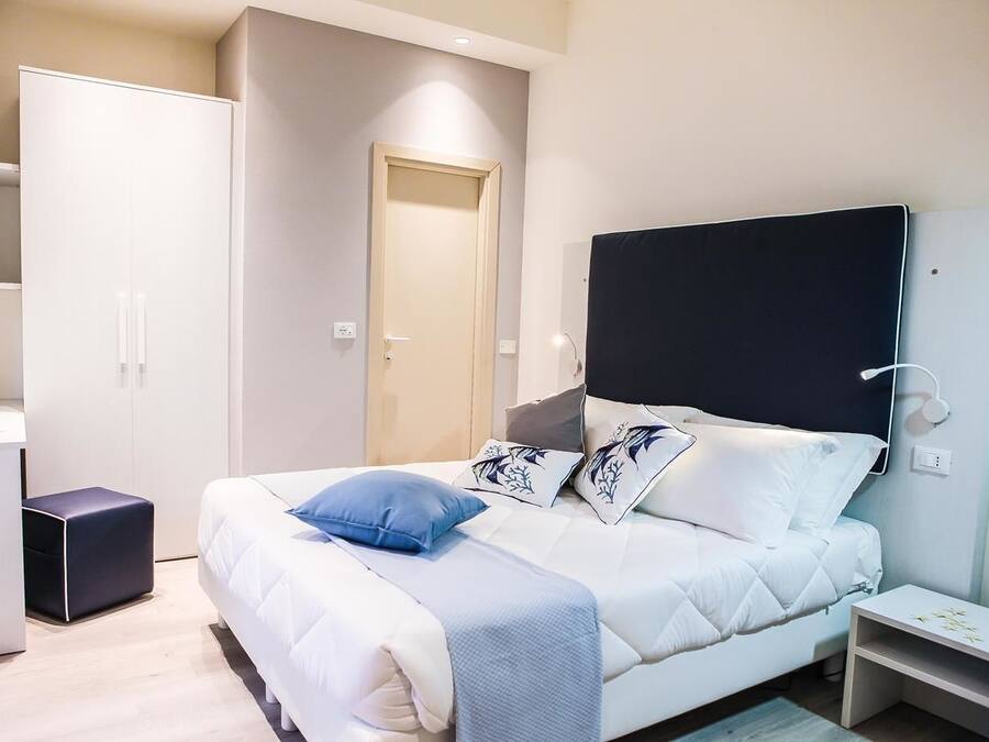 Quarto casal superior | Berços (sobretaxa), Wi-Fi de cortesia, roupa de cama