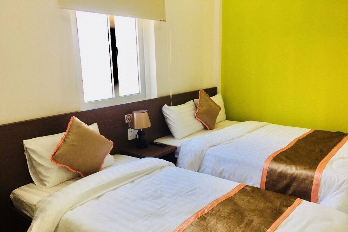 Quarto Triplo | Minibar, secretária, cortinas/cortinados opacos, quartos insonorizados 