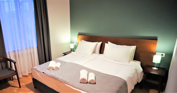 Deluxe Family Room | Cofre no quarto, secretária, quartos insonorizados, Wi-fi grátis