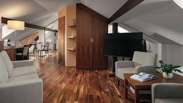 Suite Deluxe, 1 cama queen-size | Roupa hipoalergénica, minibar, cofre no quarto, secretária