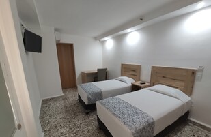 Quarto duplo executivo | Roupas de cama premium