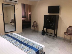 Suite Superior | Cortinas/cortinados opacos, ferro/tábua de engomar, camas desdobráveis 