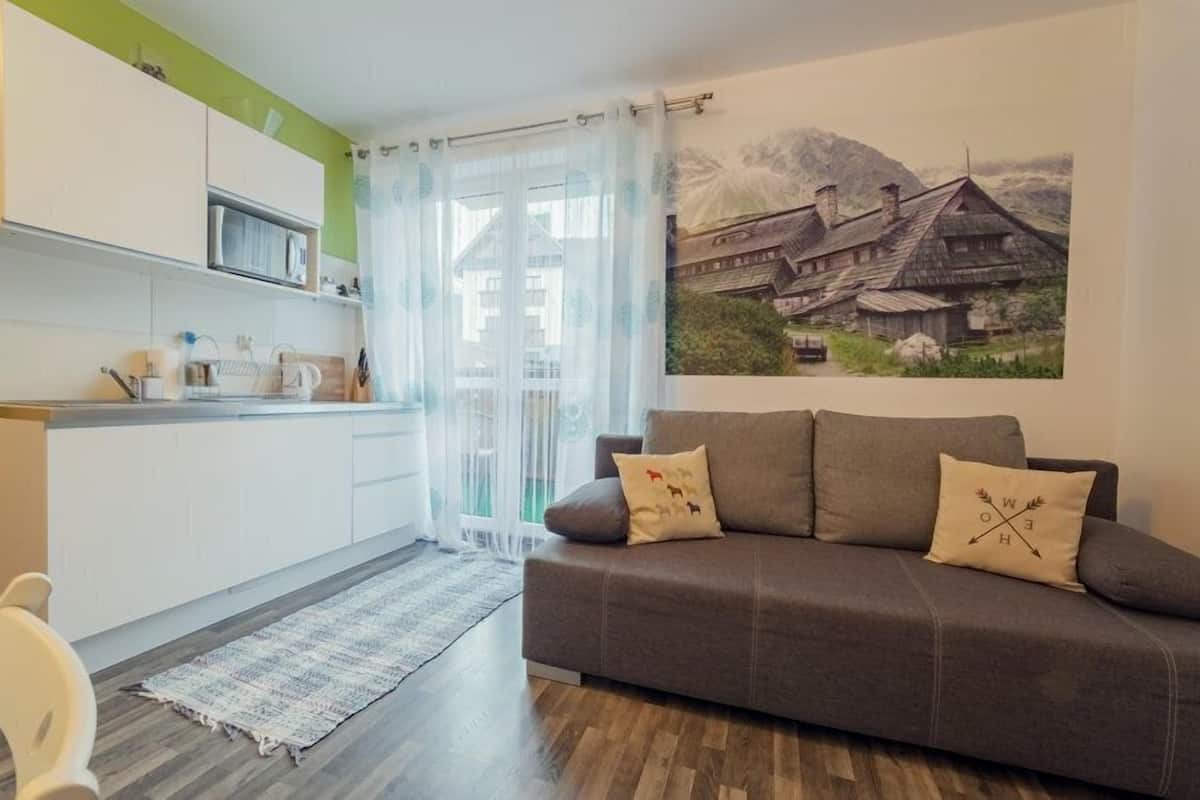 Apartamento (3a/12) | Área de estar | TV de tela plana