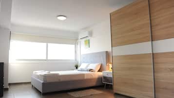 Apartamento superluxo | 1 quarto, roupas de cama premium, camas com colchões pillow-top