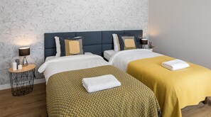 Quartos à prova de som, Wi-Fi de cortesia, roupa de cama