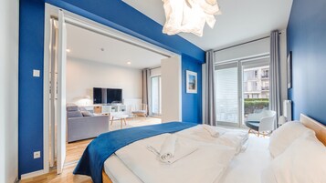 Apartamento (404 Deluxe) | Ferro/tábua de engomar, roupa de cama fornecida